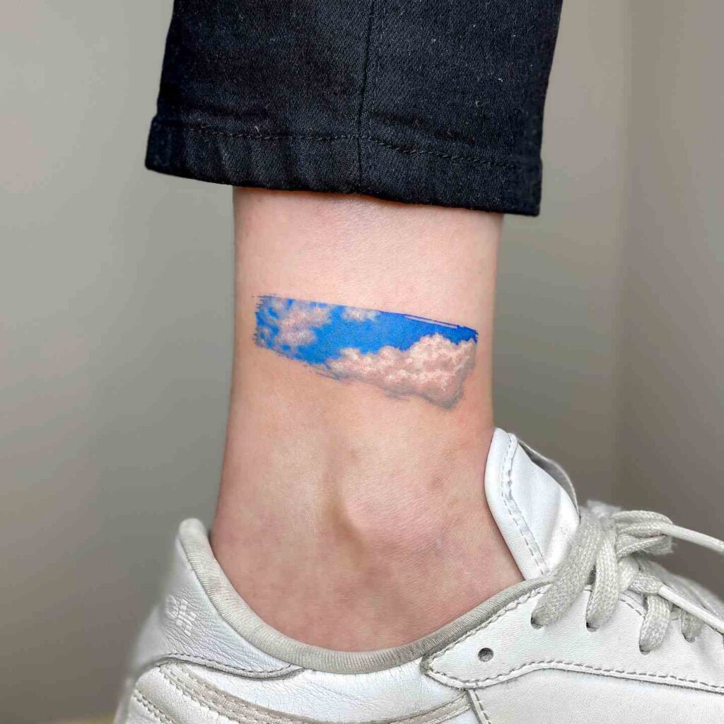 58 Cloud Tattoo Ideas for Heavenly, Ethereal Look - Tattoo Imprints