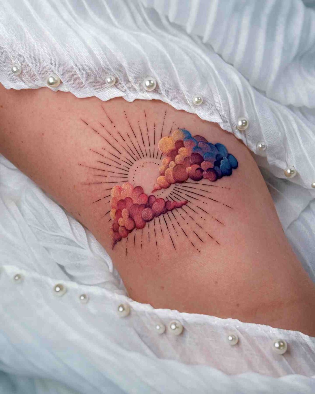 58 Cloud Tattoo Ideas for Heavenly, Ethereal Look - Tattoo Imprints